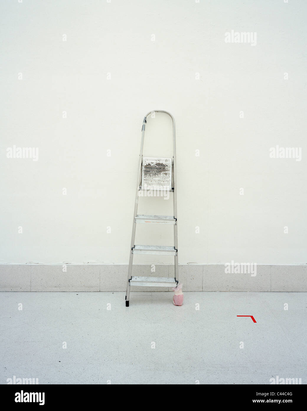 An unstable ladder Stock Photo - Alamy