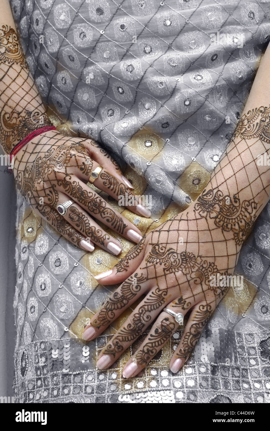 Two tone image showing henna designs that match the bride's maid's ...