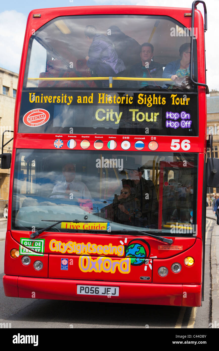 Tourist sightseeing bus stopping in front of the Sheldonian, Oxford 2 ...