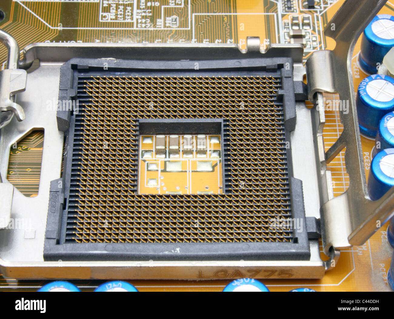 The computer the processor on a white background is isolated gold color ...