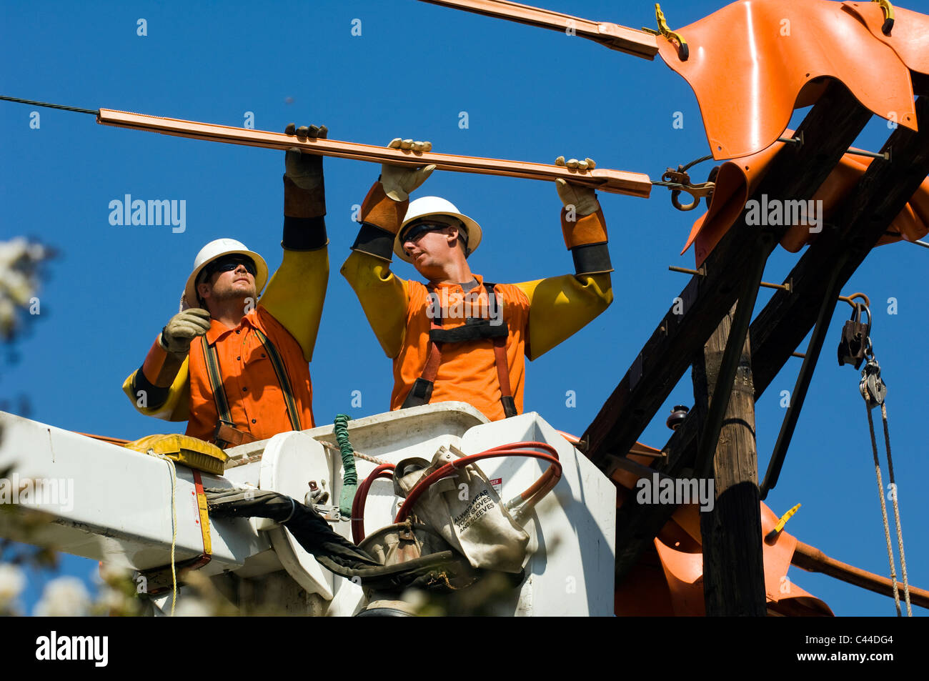 electric utility lineman Stock Photo - Alamy