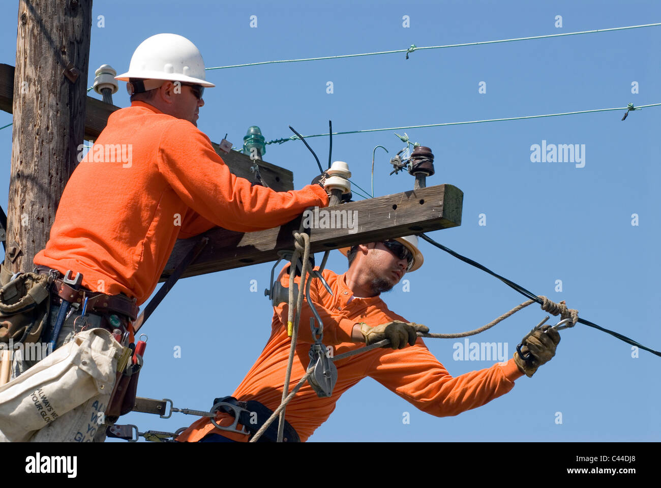 electric utility lineman Stock Photo - Alamy