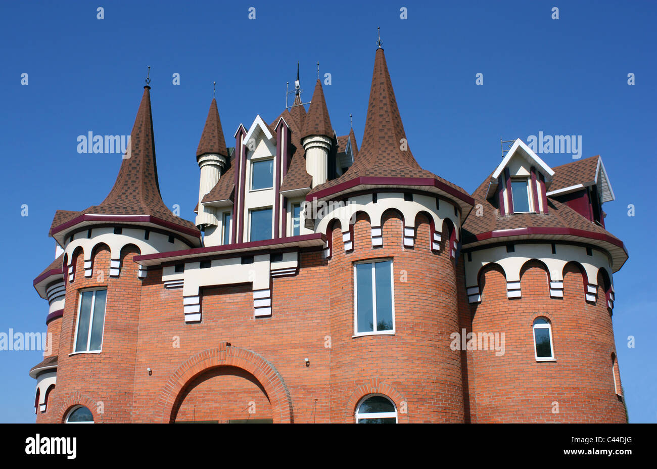 The house with a beautiful roof with windows and carved domes from a ...