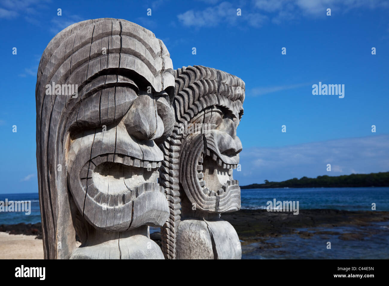 wooden tikis on Hawaii island Stock Photo - Alamy
