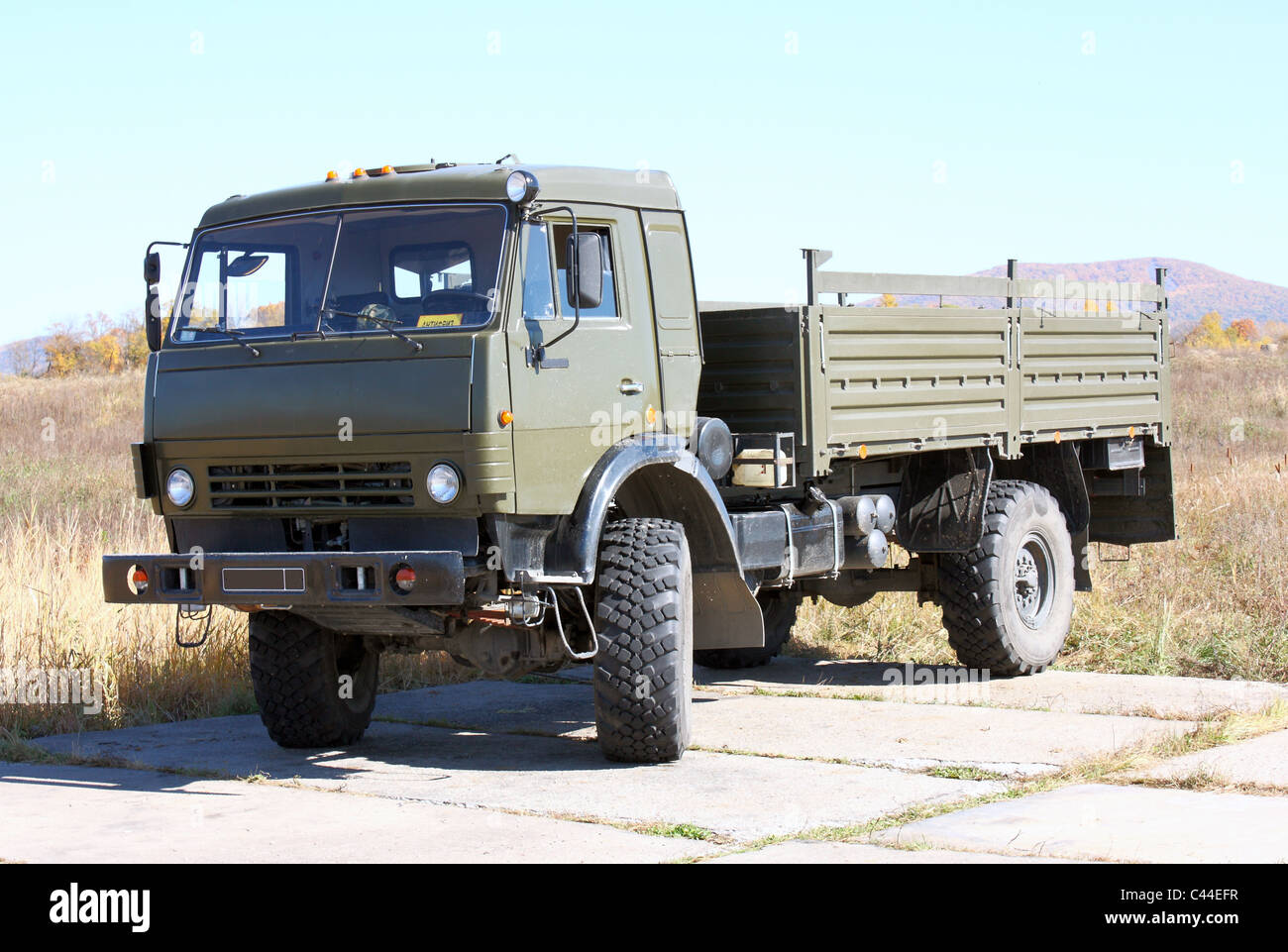 The military lorry with a color body khaki and the big wheels Stock ...