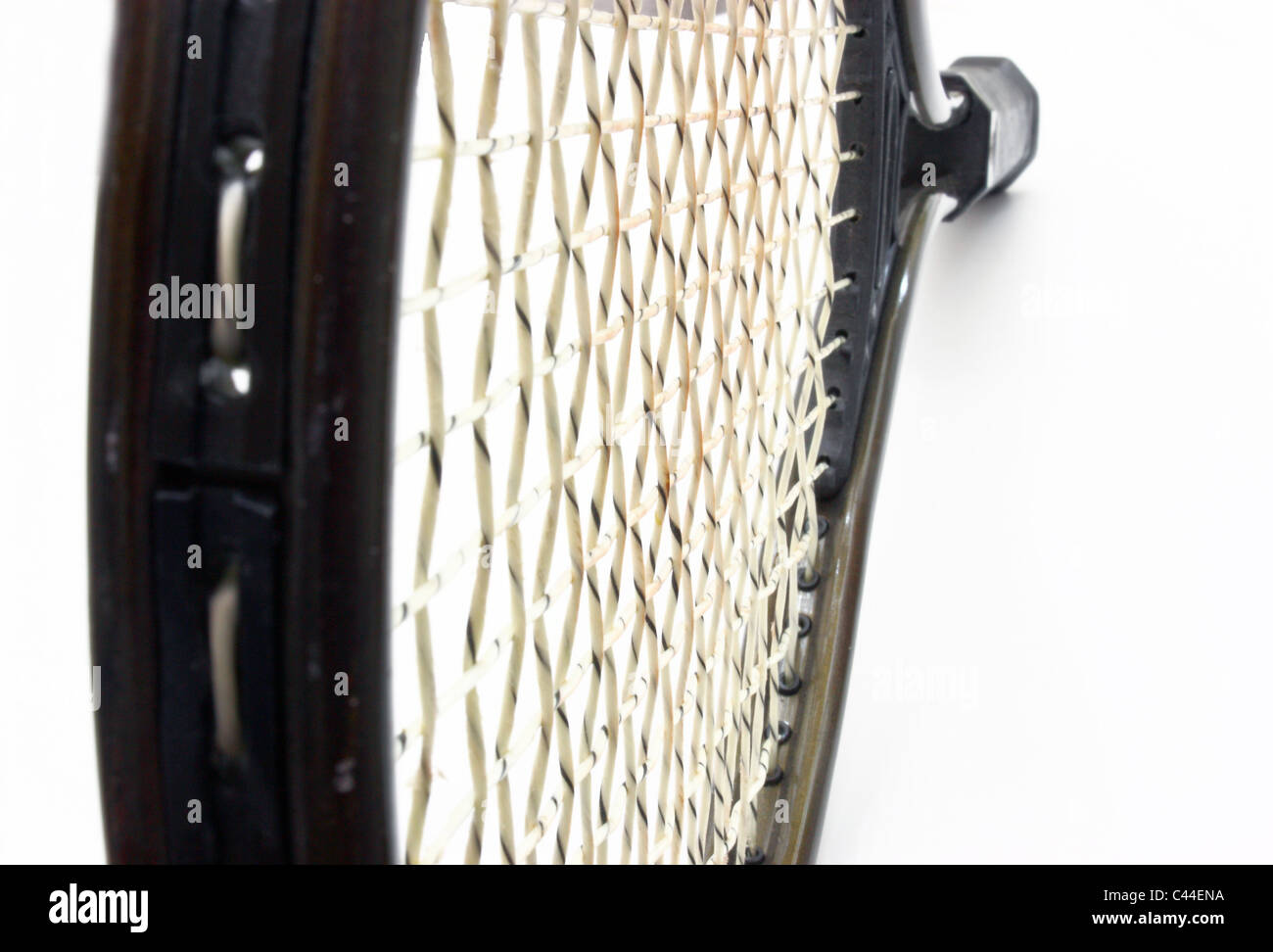 Tennis racket of brown color on a white background Stock Photo - Alamy