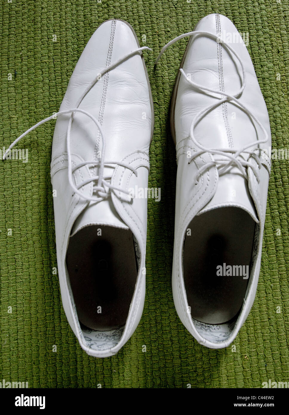 A pair of white shoes Stock Photo - Alamy
