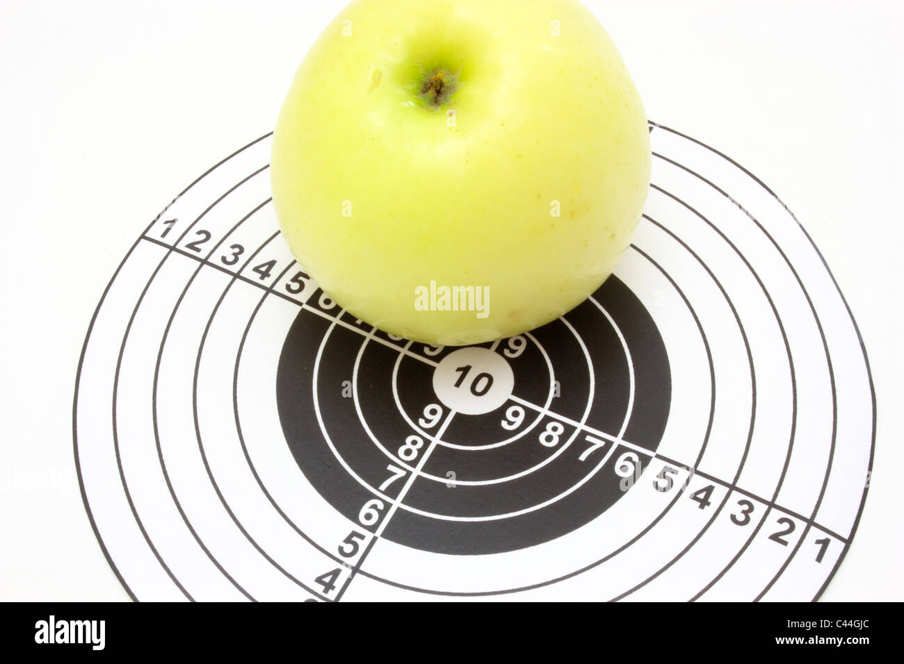 target and apple isolated on a white background Stock Photo - Alamy