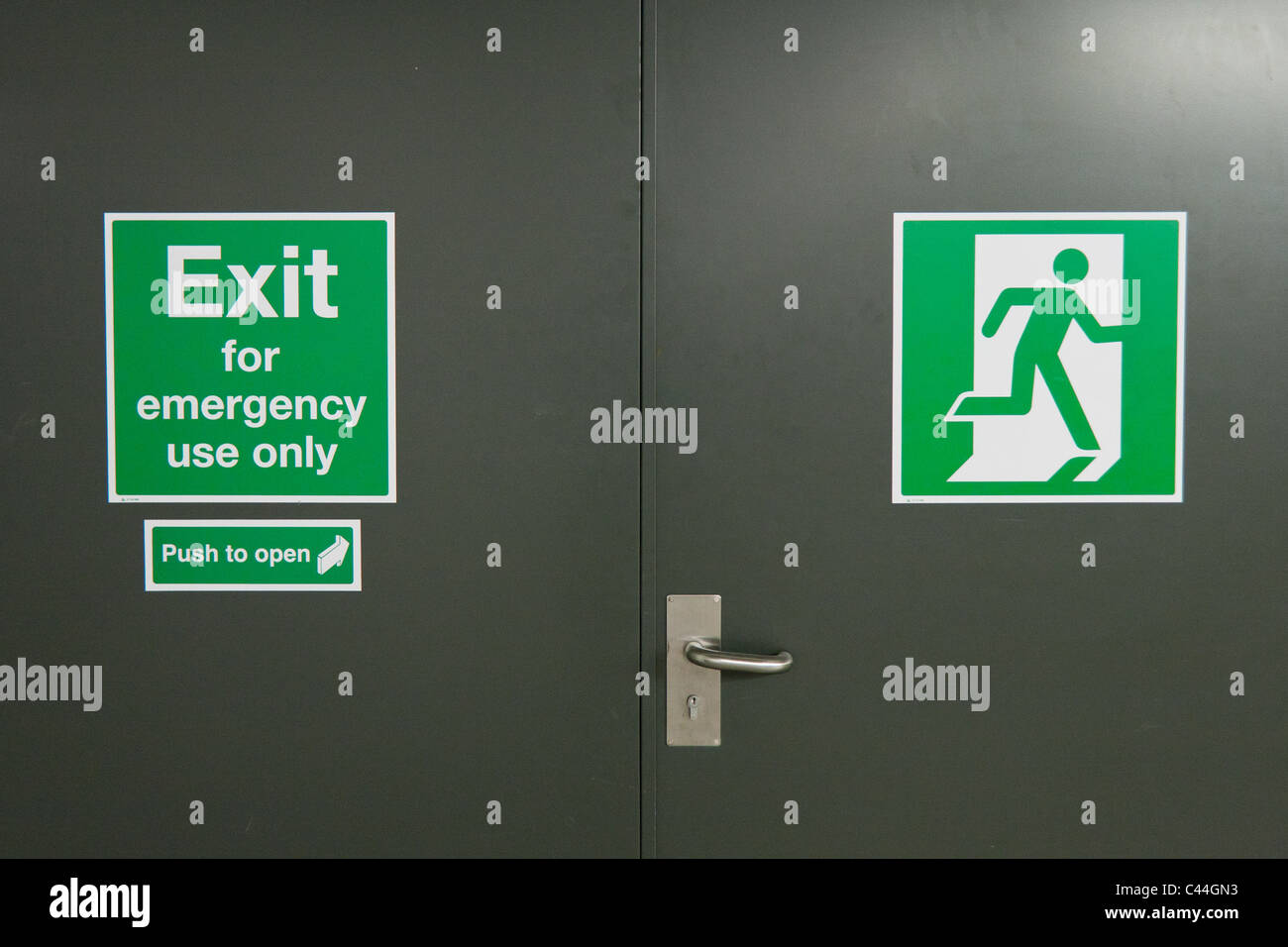 Emergency exit sign Stock Photo - Alamy