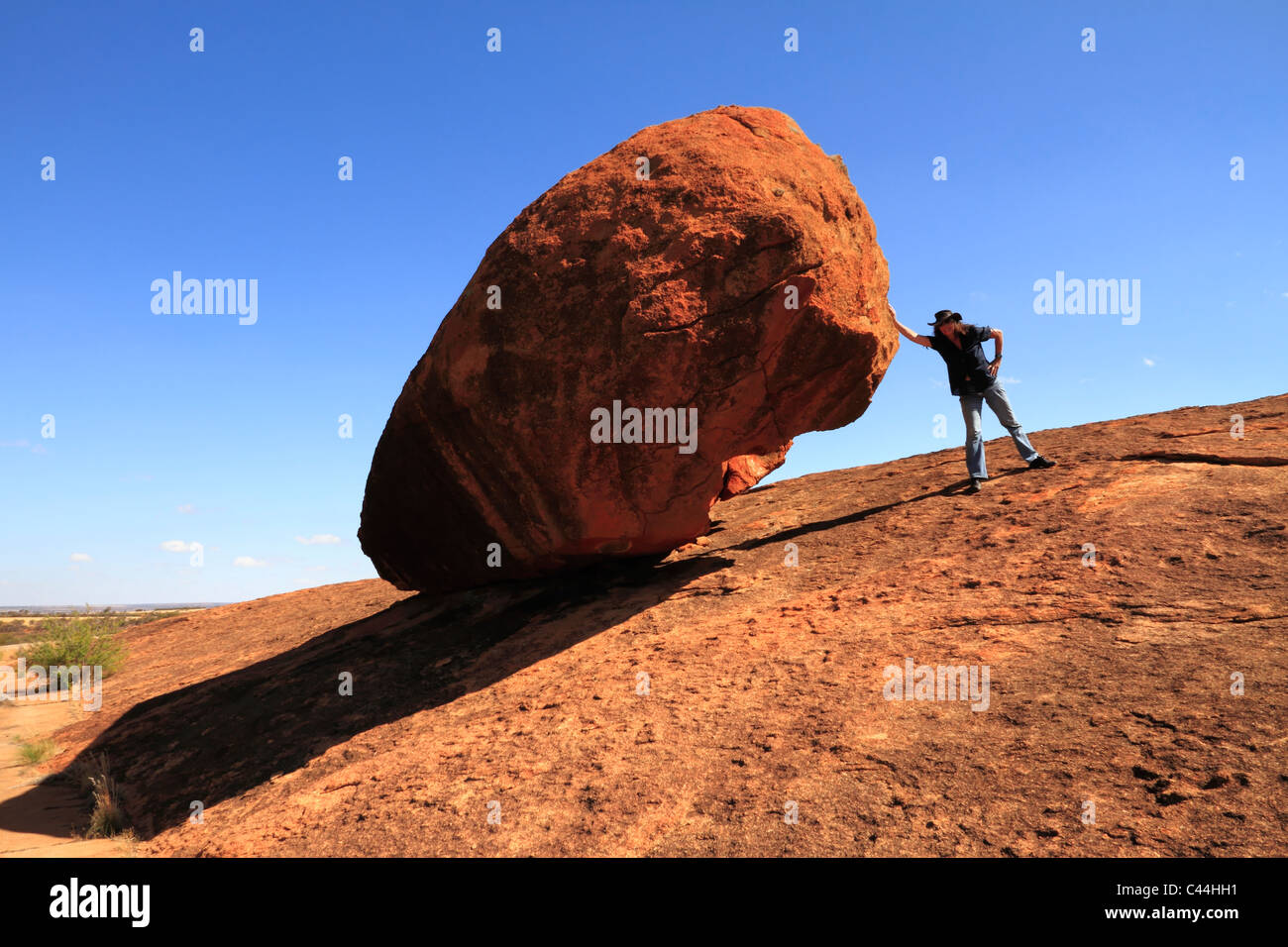 Pushing boulder hi-res stock photography and images - Alamy