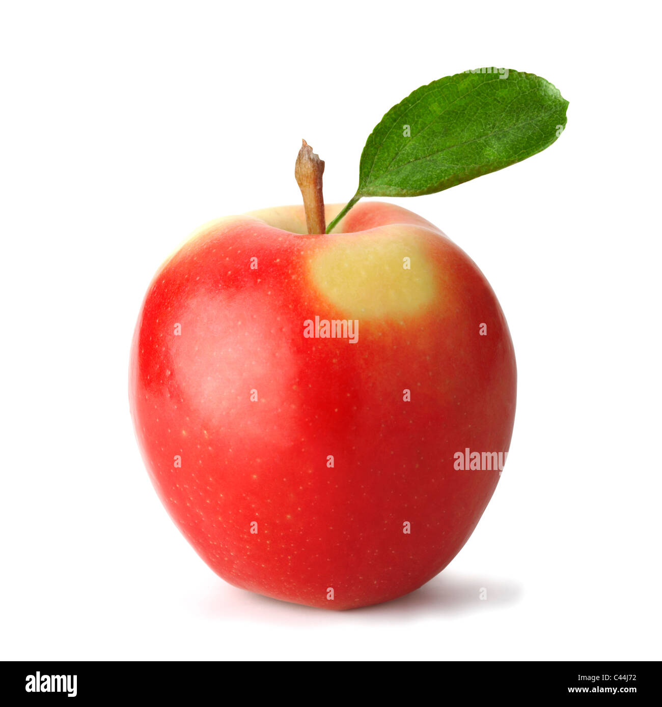 Fresh red apple with leaf. The file includes a clipping path ...