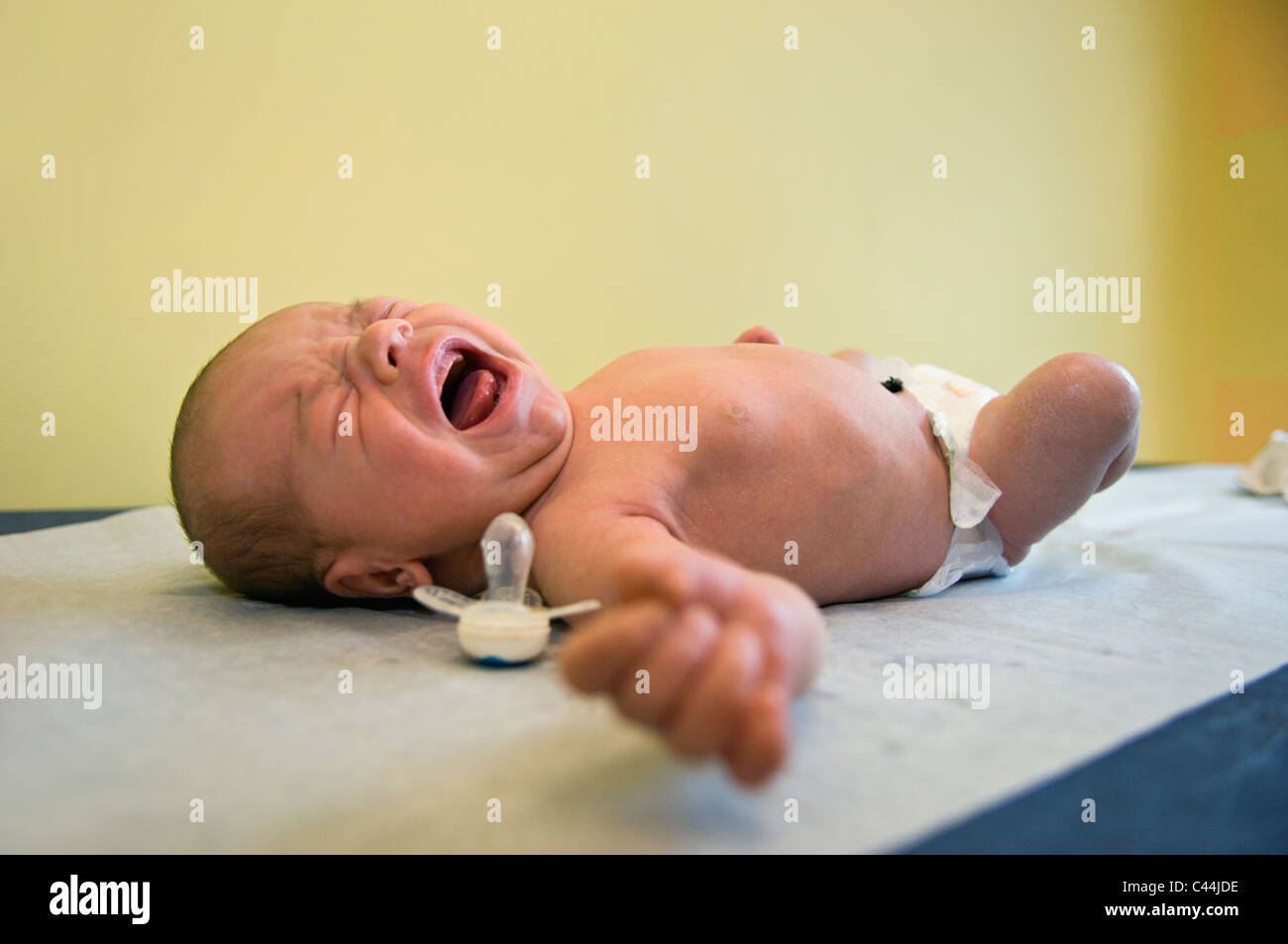 Diaper baby crying hi-res stock photography and images - Alamy