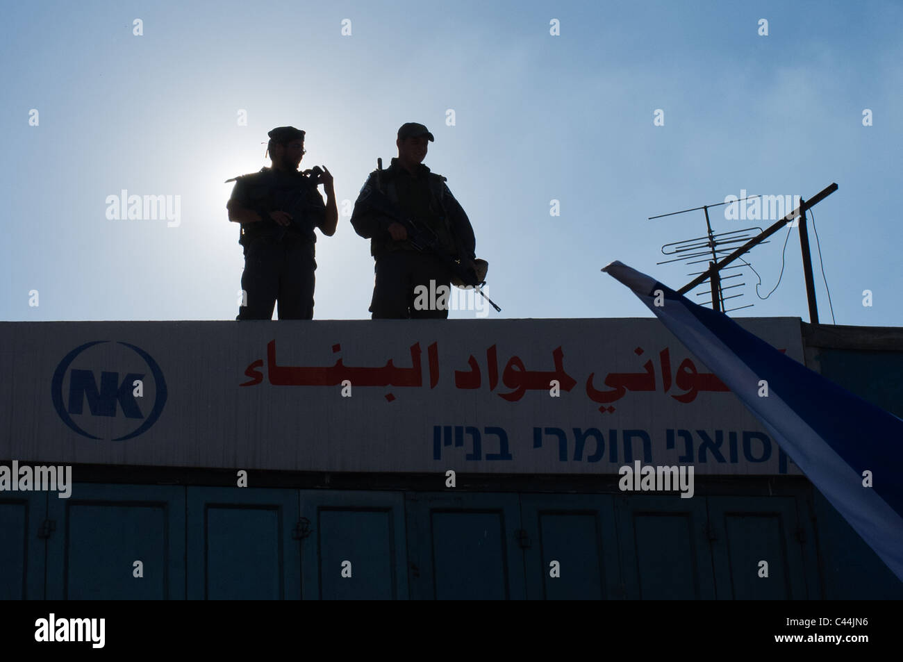Border Police rooftop security for Dance of Flags in Sheikh Jarrah on ...