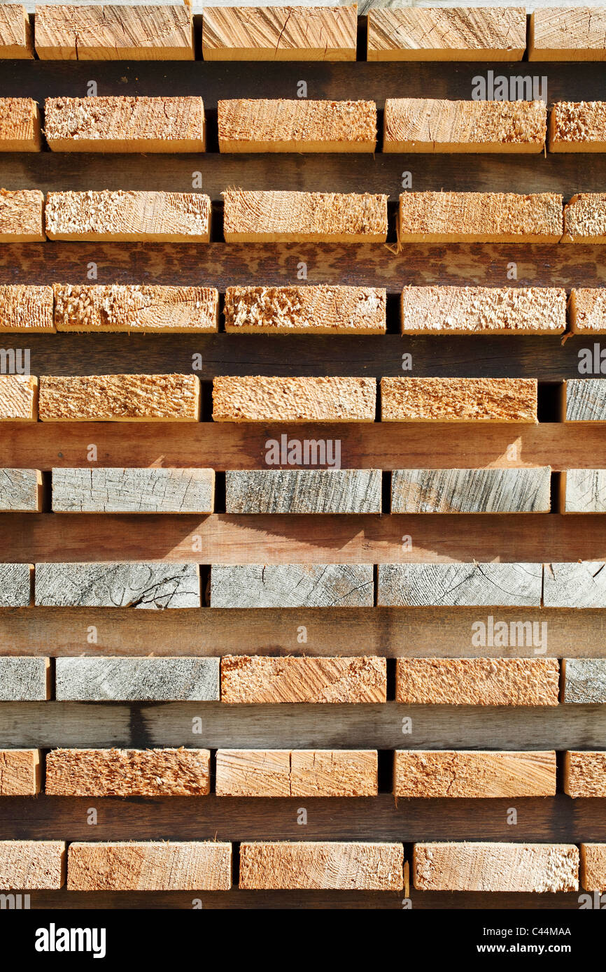 Close up view of stacked lumber Stock Photo - Alamy