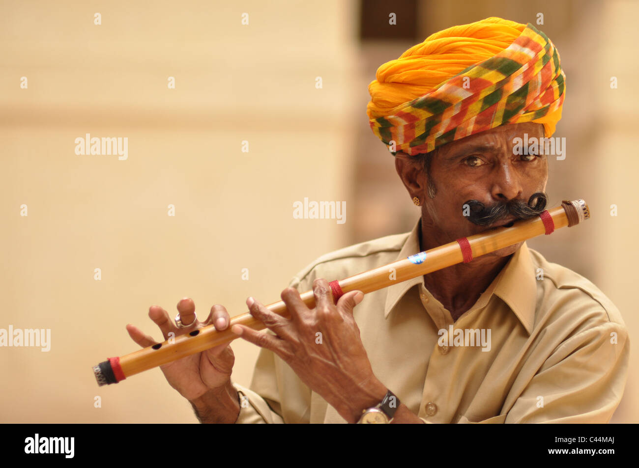 A Local Musician playing Flute in fort in Jodhpur Stock Photo - Alamy