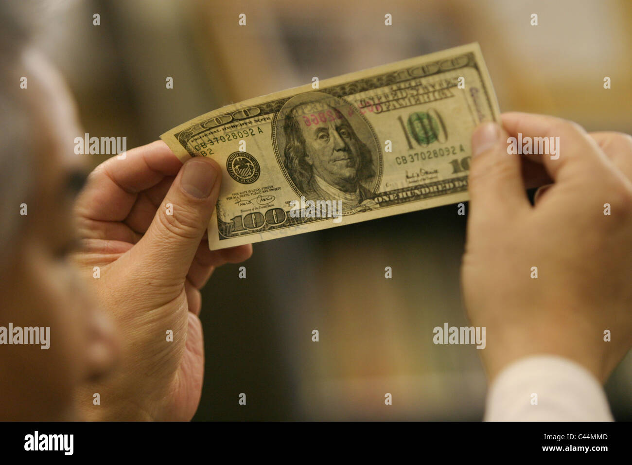 Fake American dollar bank notes, and diagrams of them, on display by ...