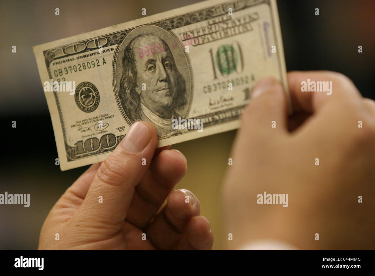 Fake American dollar bank notes, and diagrams of them, on display by ...