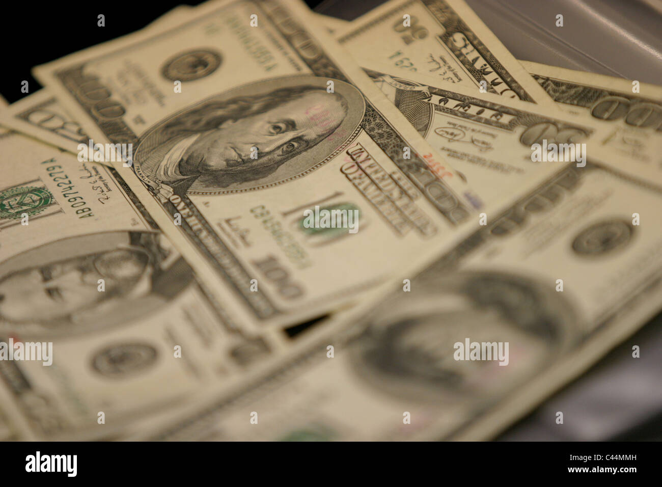 Fake American dollar bank notes, and diagrams of them, on display by ...