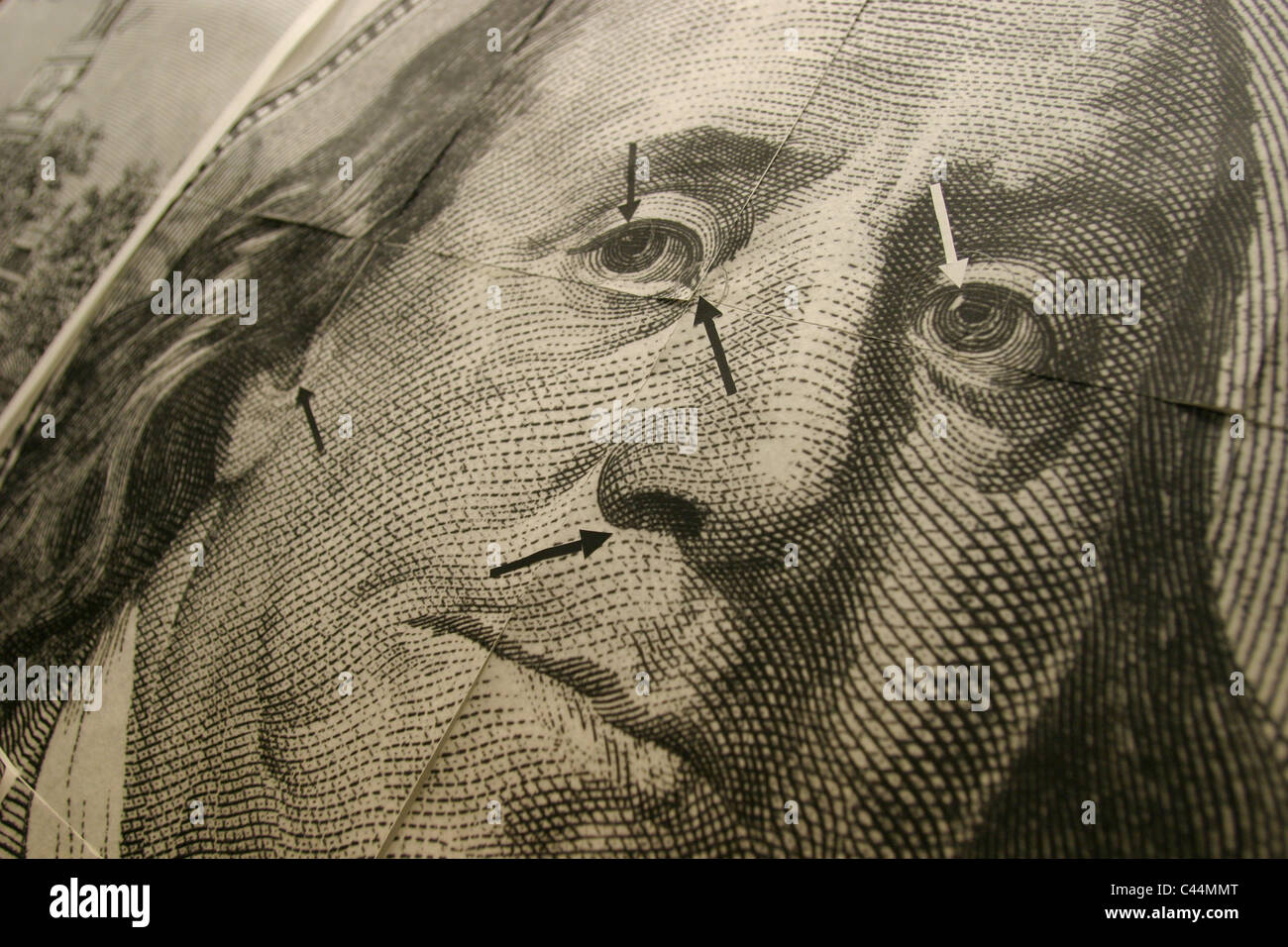 Fake American dollar bank notes, and diagrams of them, on display by ...