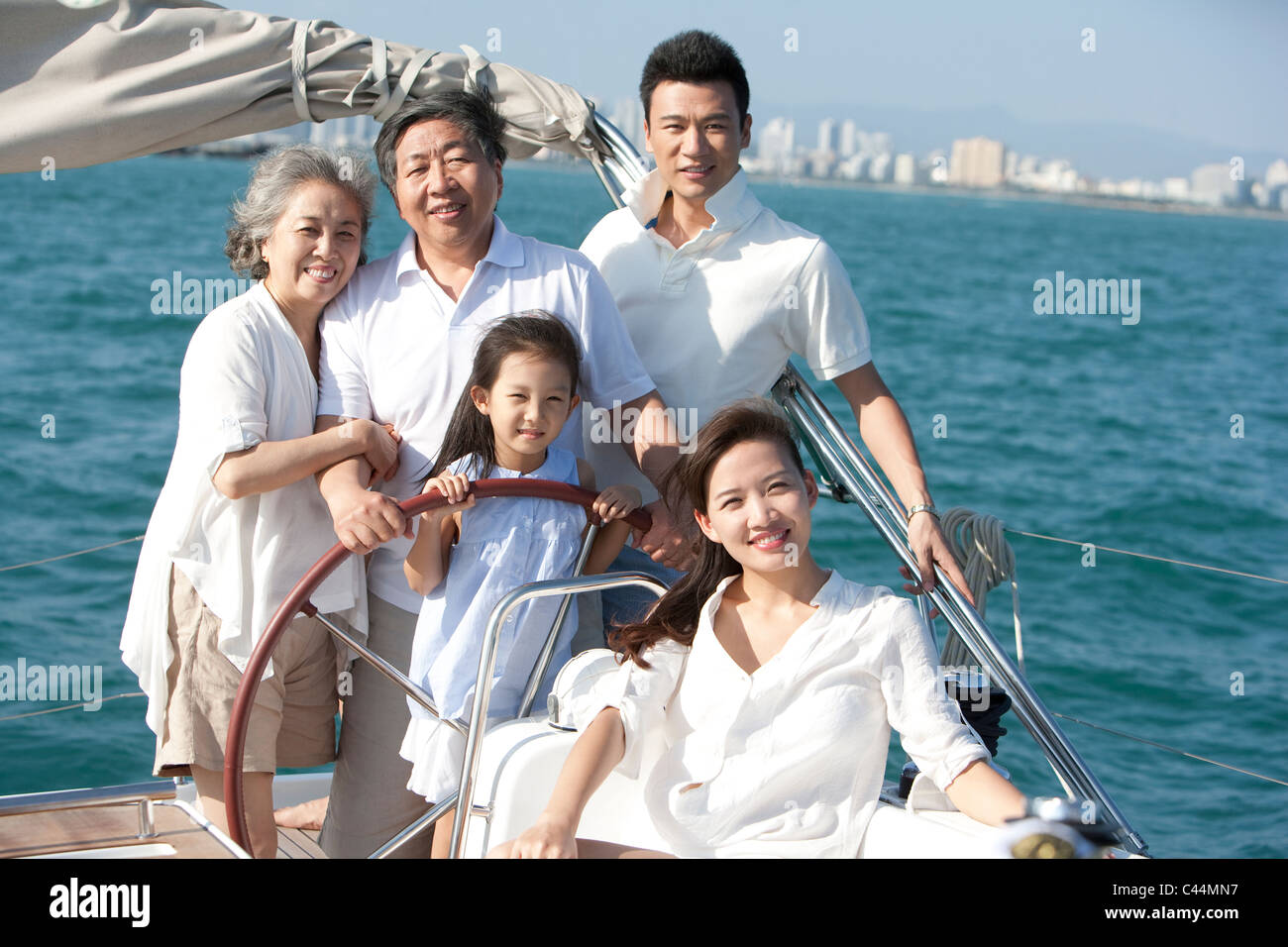 Happy Family Sailing Stock Photo - Alamy
