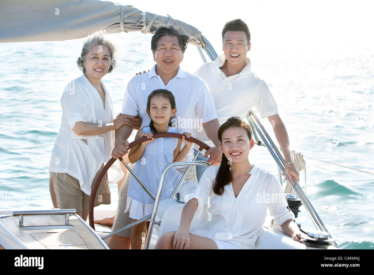 Happy Family Sailing Stock Photo - Alamy