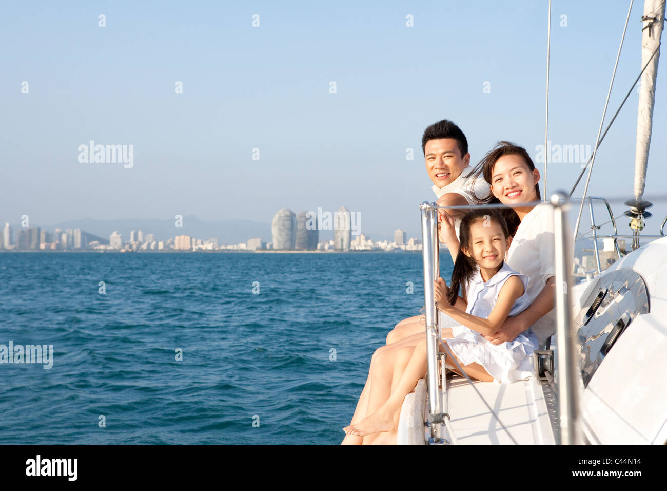 Family Sitting on the Deck Stock Photo - Alamy