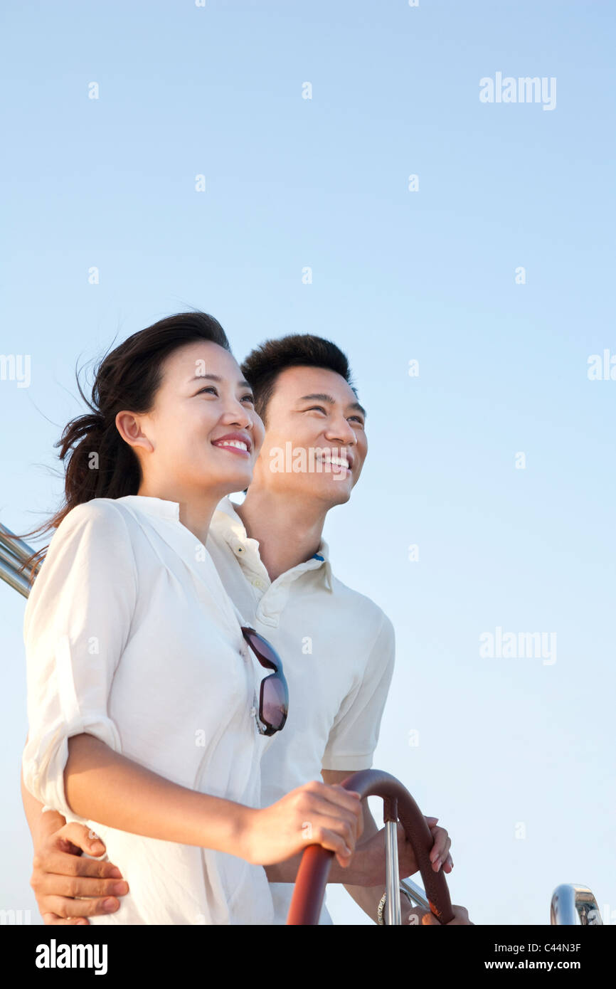 Two men together on sailboat hi-res stock photography and images - Alamy