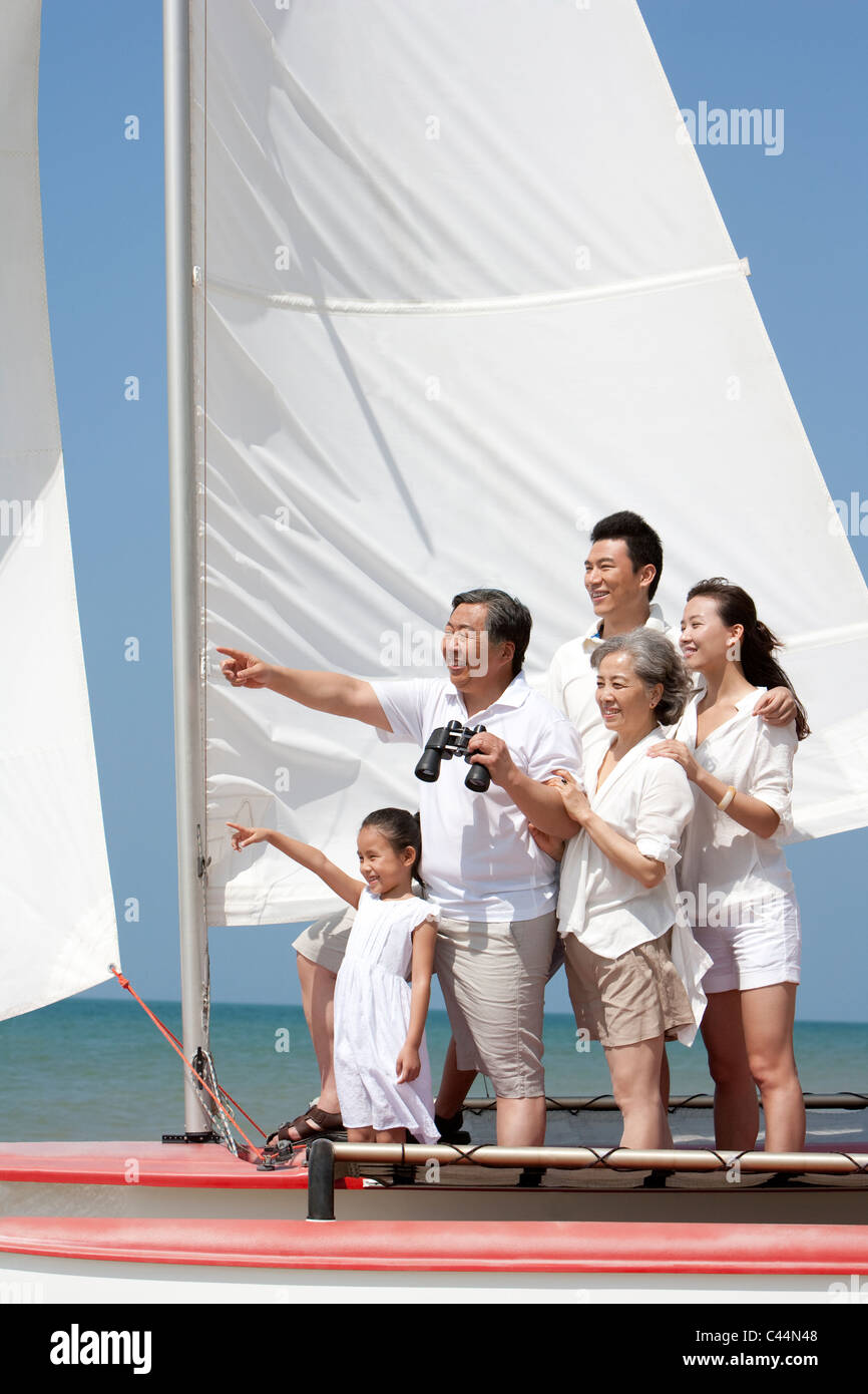 Happy Family On a Sailboat Stock Photo - Alamy