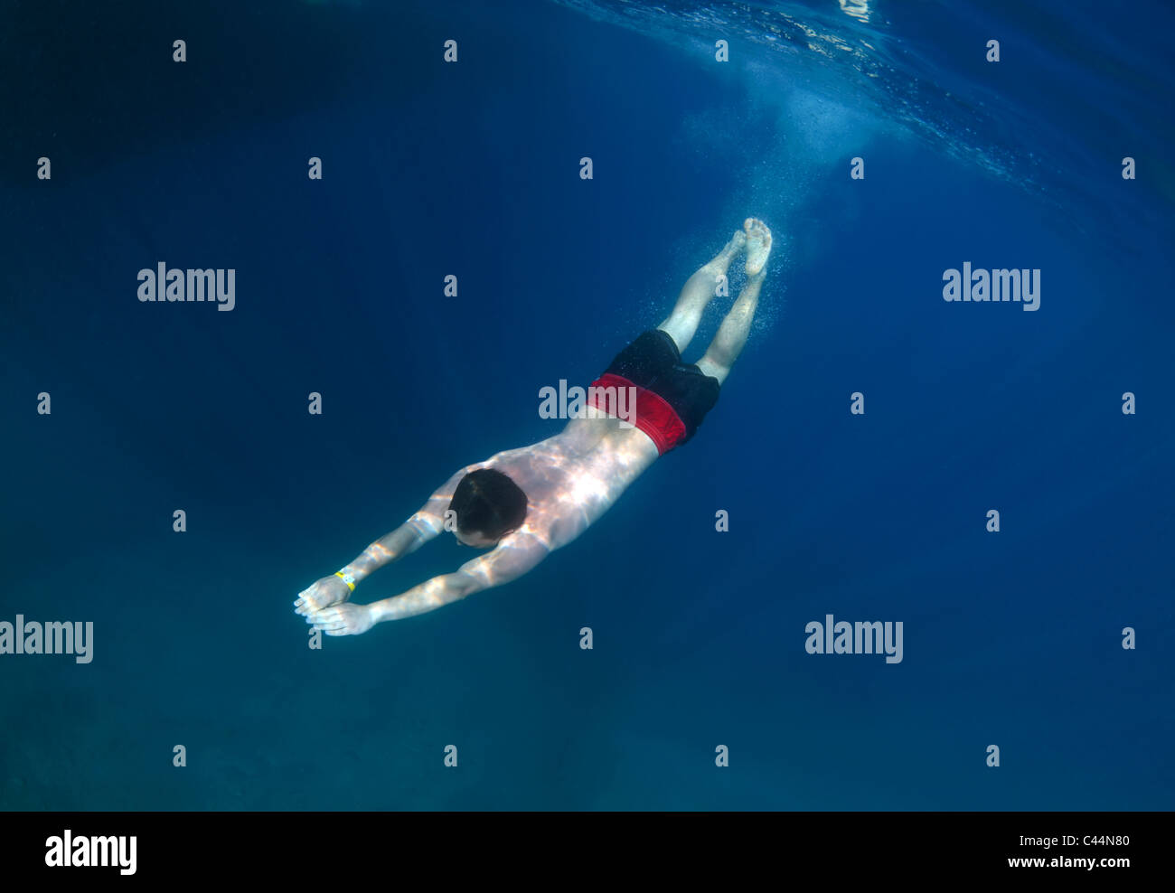 Man diving, Cleopatra island (Sedir Island), Aegean Sea, Turkey Stock ...