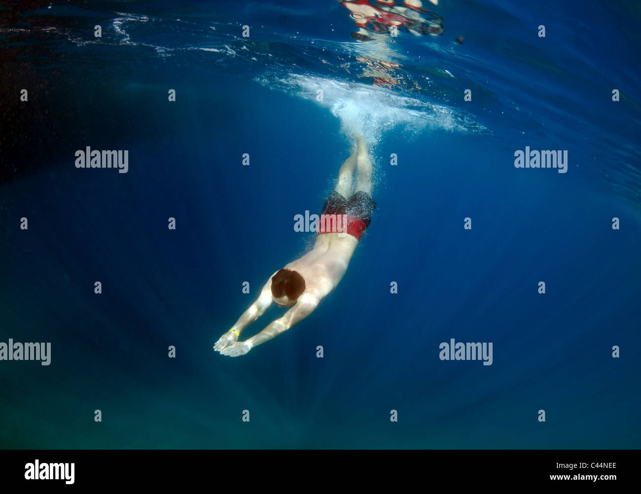 Man diving, Cleopatra island (Sedir Island), Aegean Sea, Turkey Stock ...