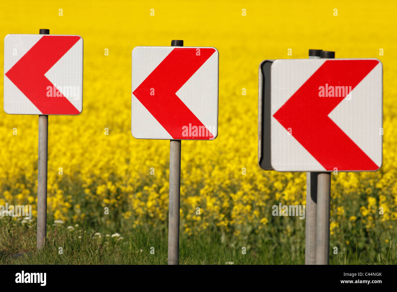 directional arrows for caution against sharp turn Stock Photo - Alamy