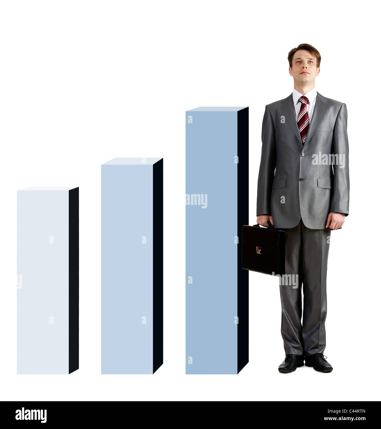 Image of happy businessman standing by the highest chart column Stock ...