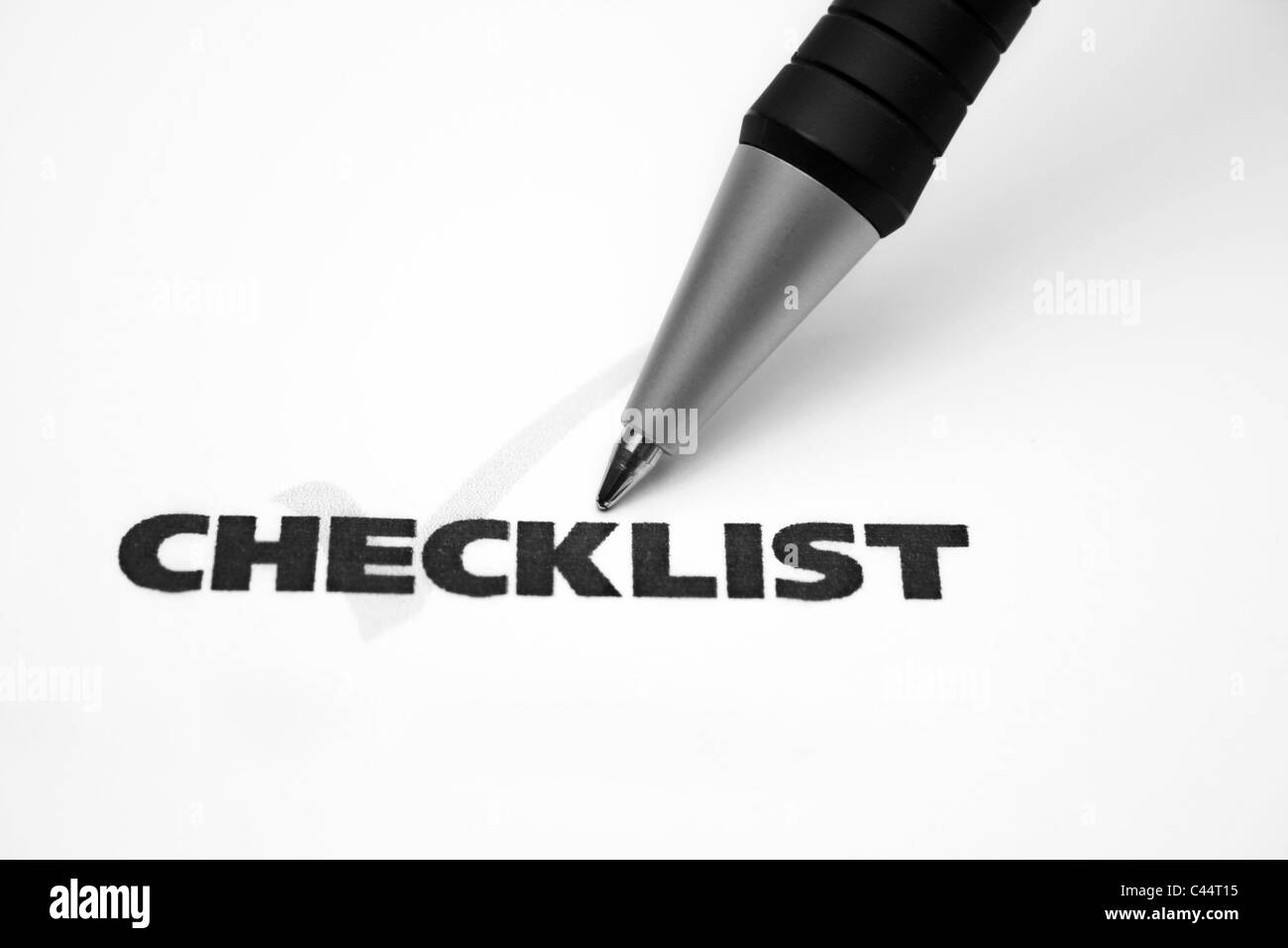 Tick with pen Black and White Stock Photos & Images - Alamy