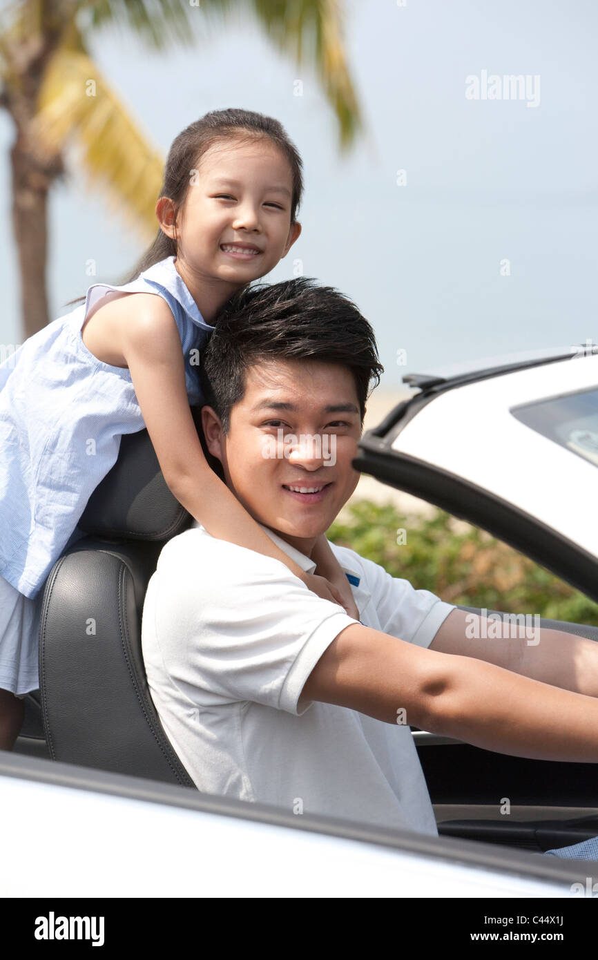 Father and Daughter Driving in a Convertible Stock Photo - Alamy