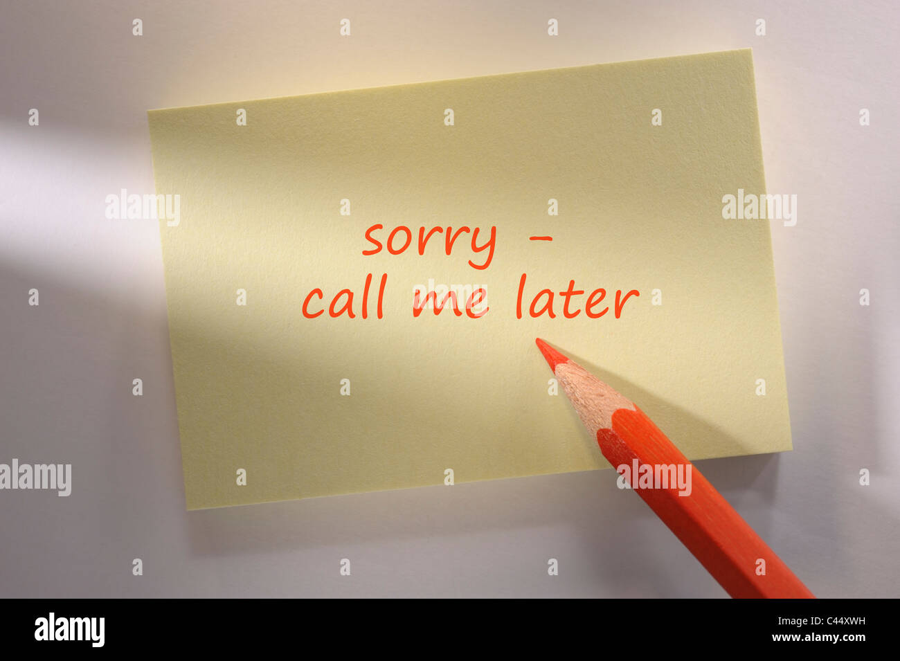memo note written with red pencil - sorry - call me later Stock Photo ...