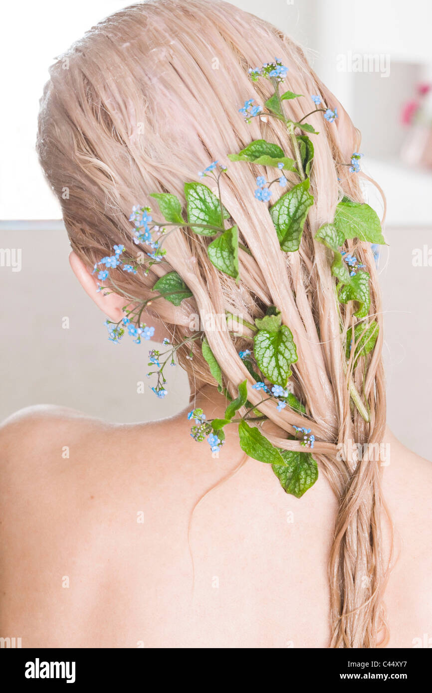Woman with herbal hair mask Stock Photo - Alamy