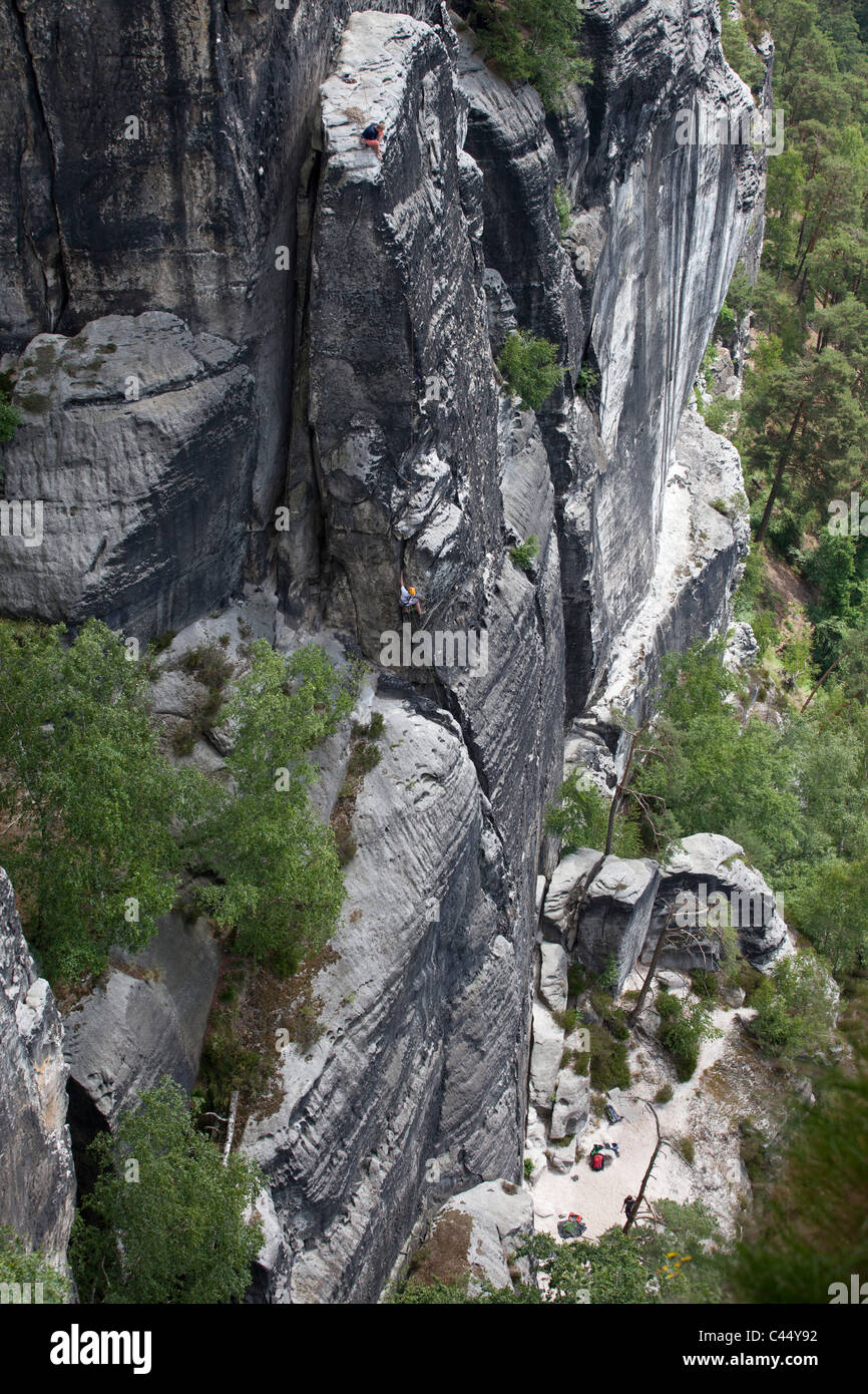 Men rock climbing Stock Photo - Alamy
