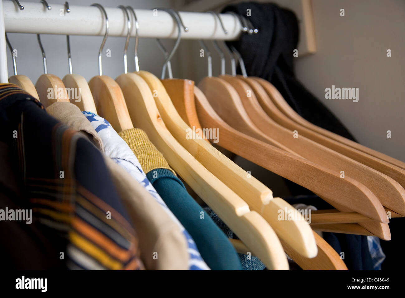 Mens clothes hanging on hooks hi-res stock photography and images - Alamy