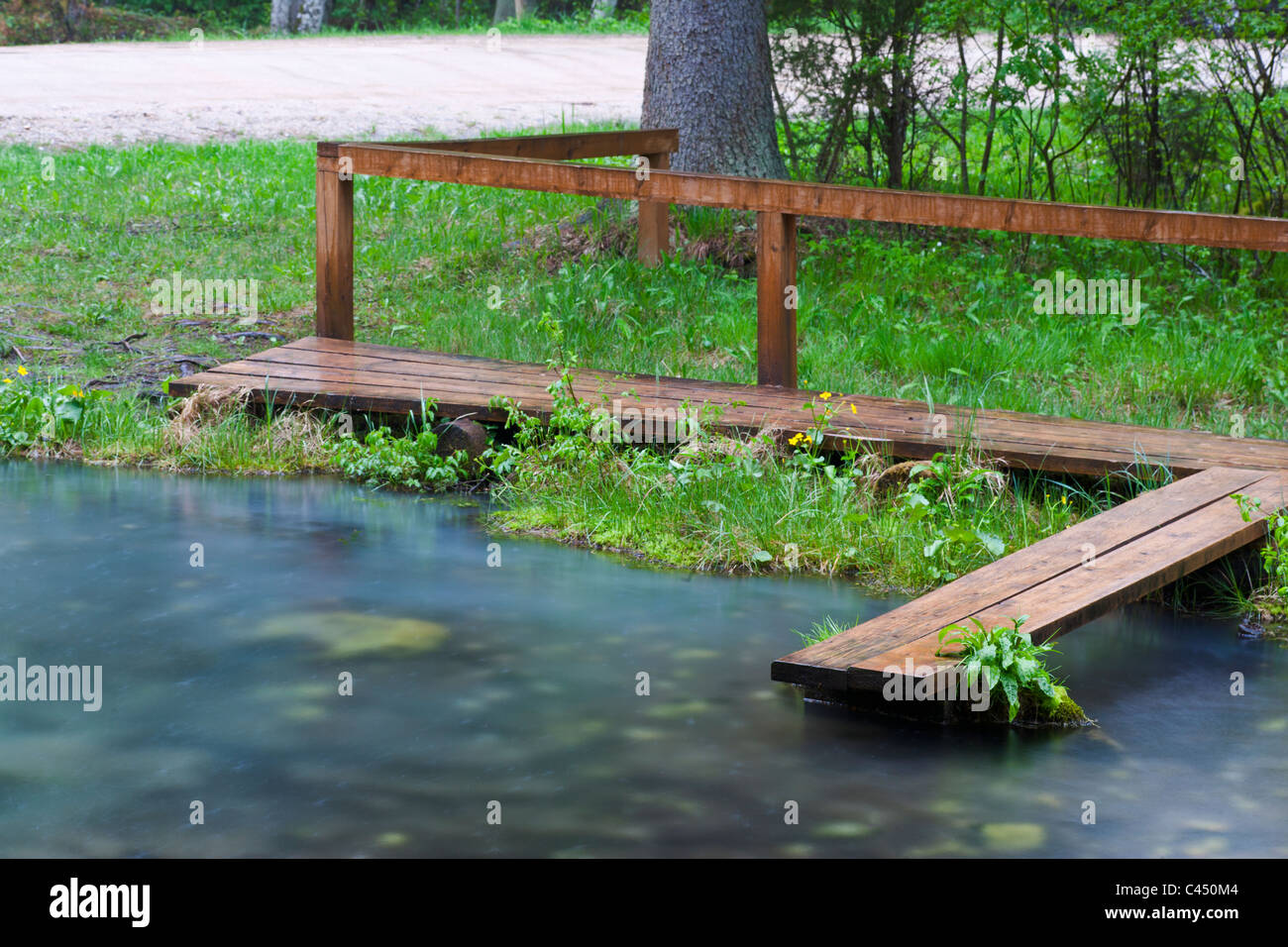 Boardwalk by the spring lake Stock Photo - Alamy