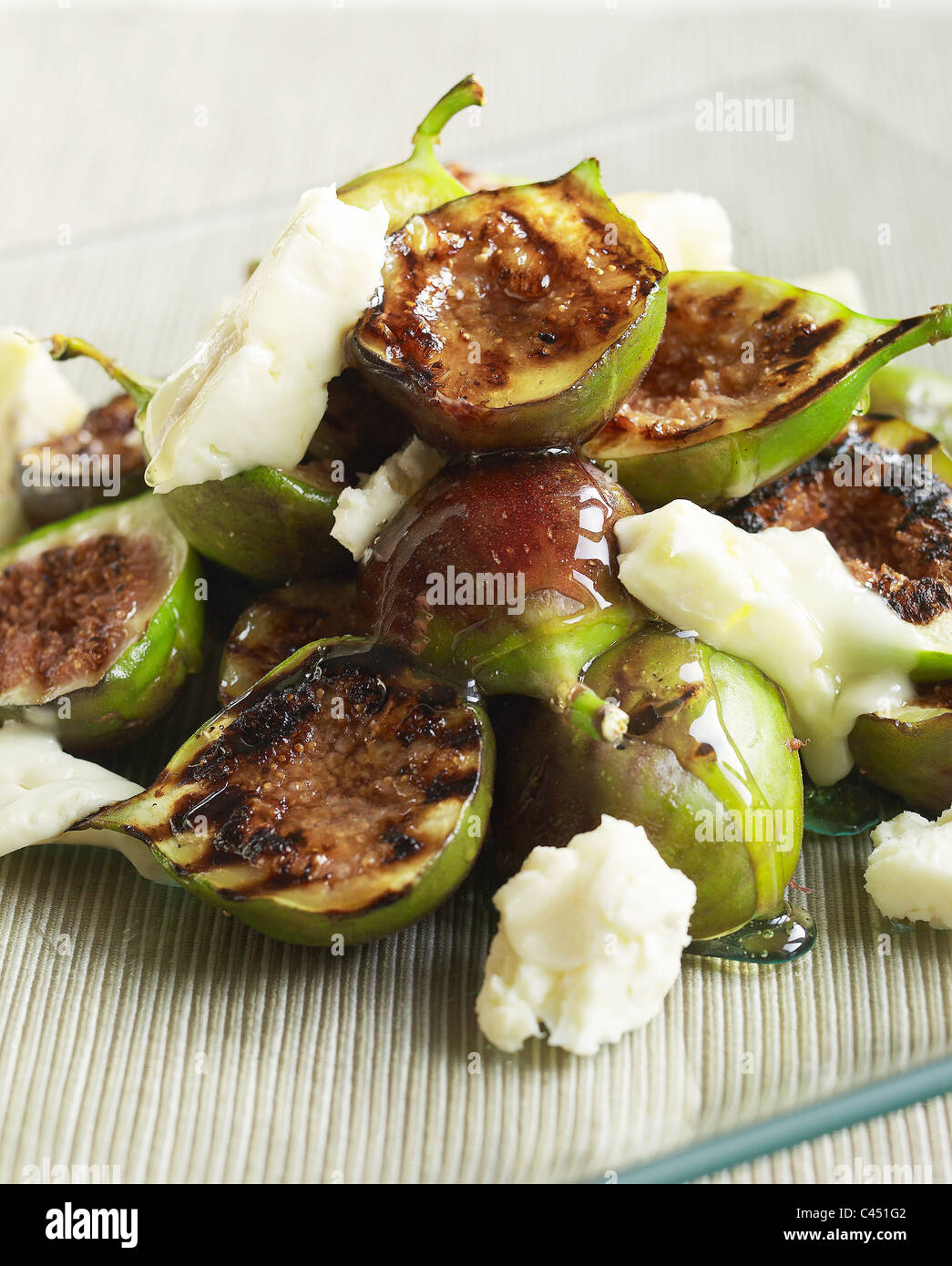 Roasted figs with cheese Stock Photo - Alamy