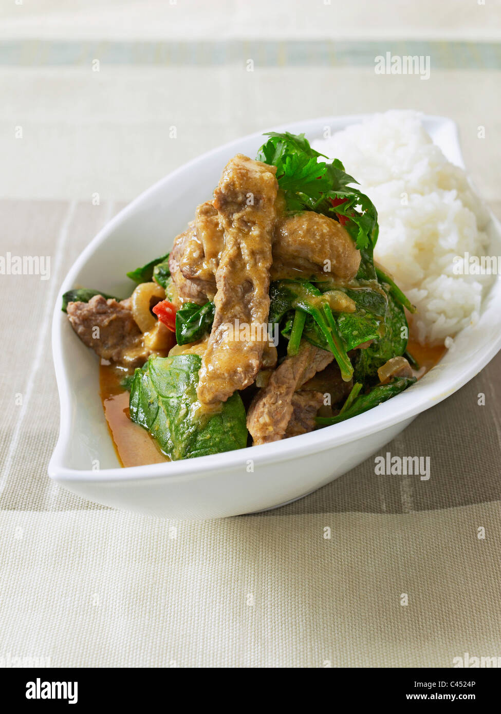 Curry on rice hi-res stock photography and images - Alamy