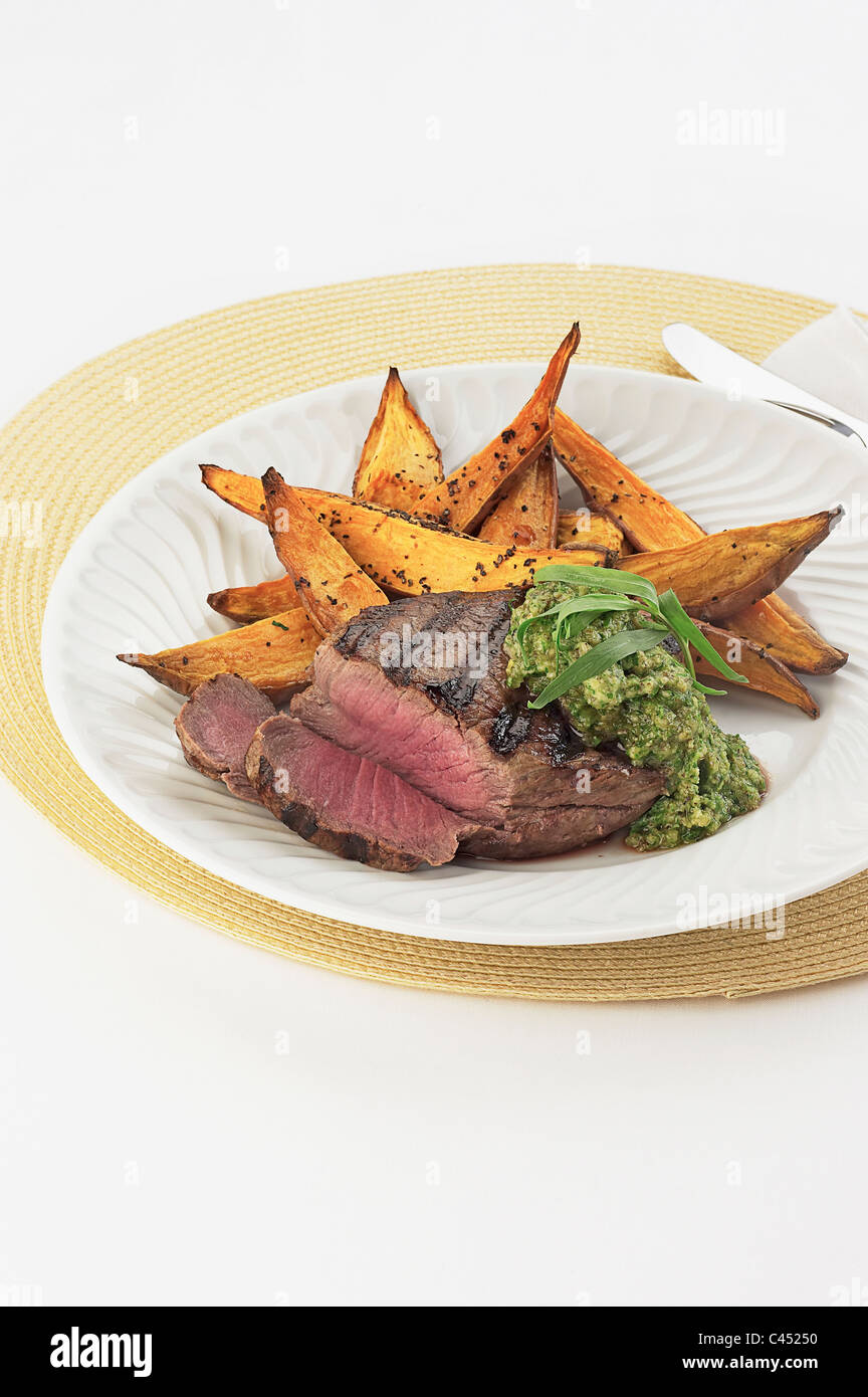 Seared fillet of beef with vegetables on plate, close-up Stock Photo ...