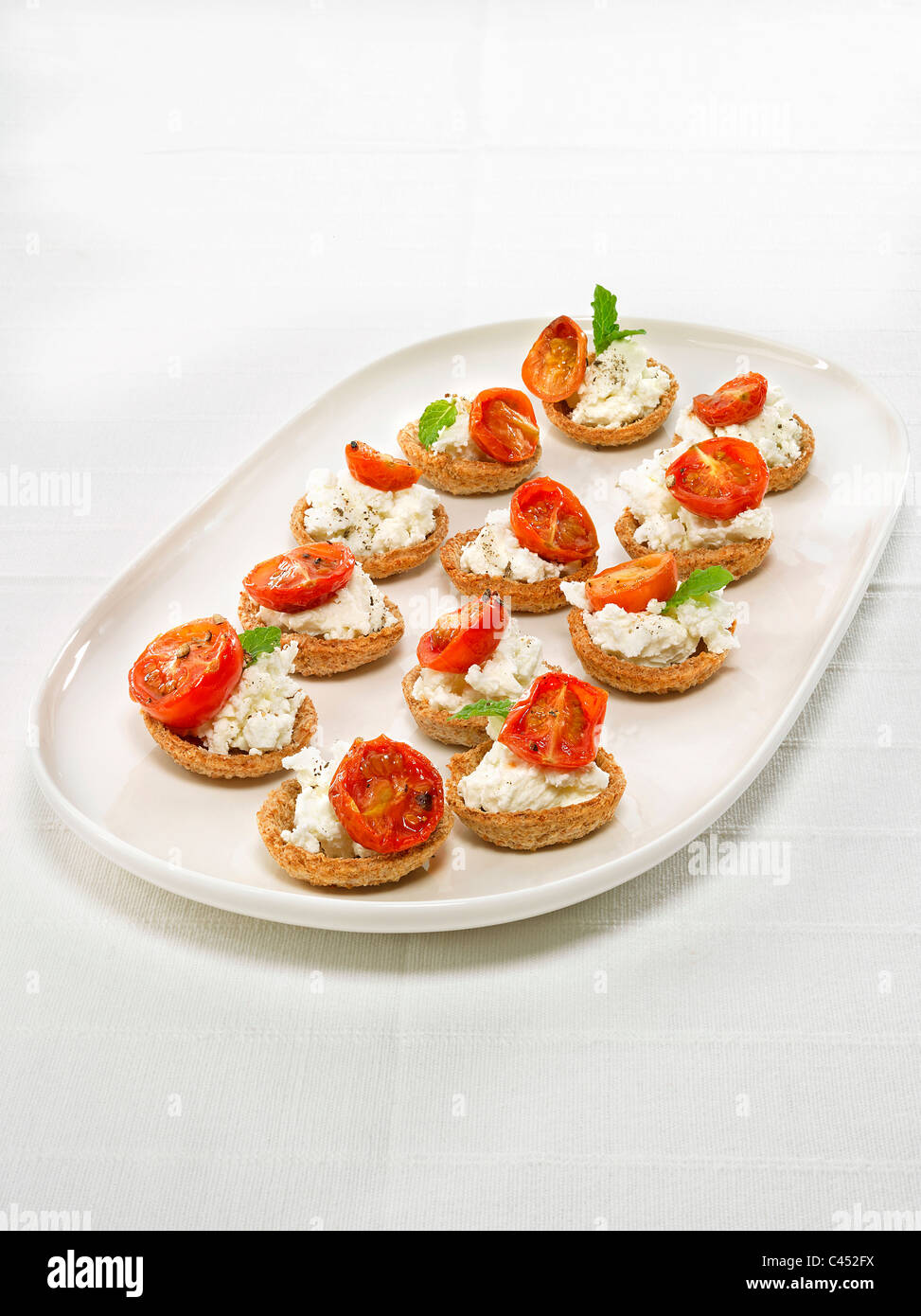 Goat's cheese croustades, close-up Stock Photo - Alamy