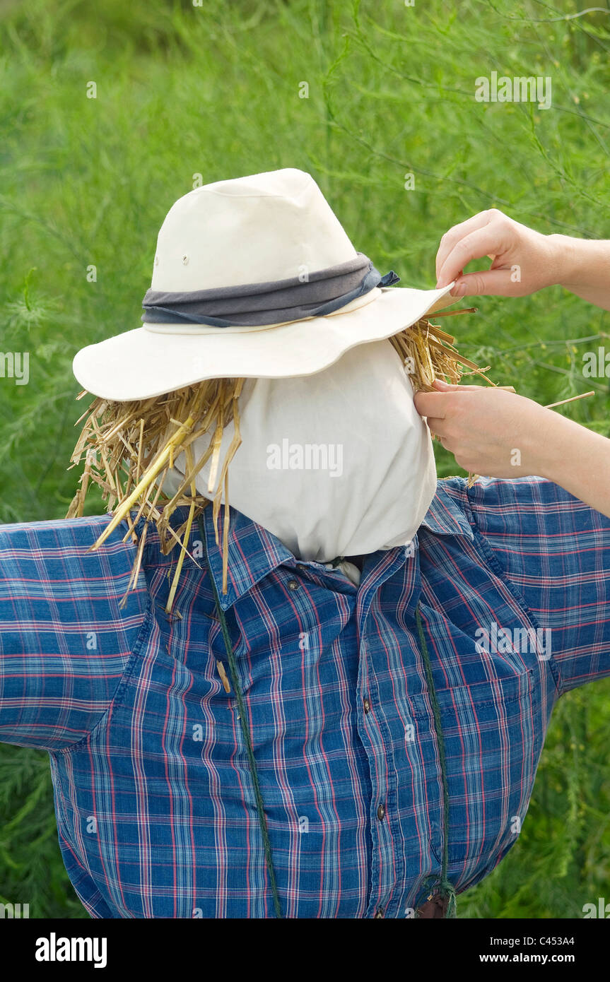 Person making scarecrow hi-res stock photography and images - Alamy