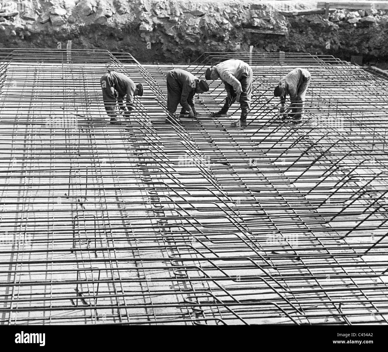 Workers building a bunker on the Atlantic Wall, 1944 Stock Photo - Alamy