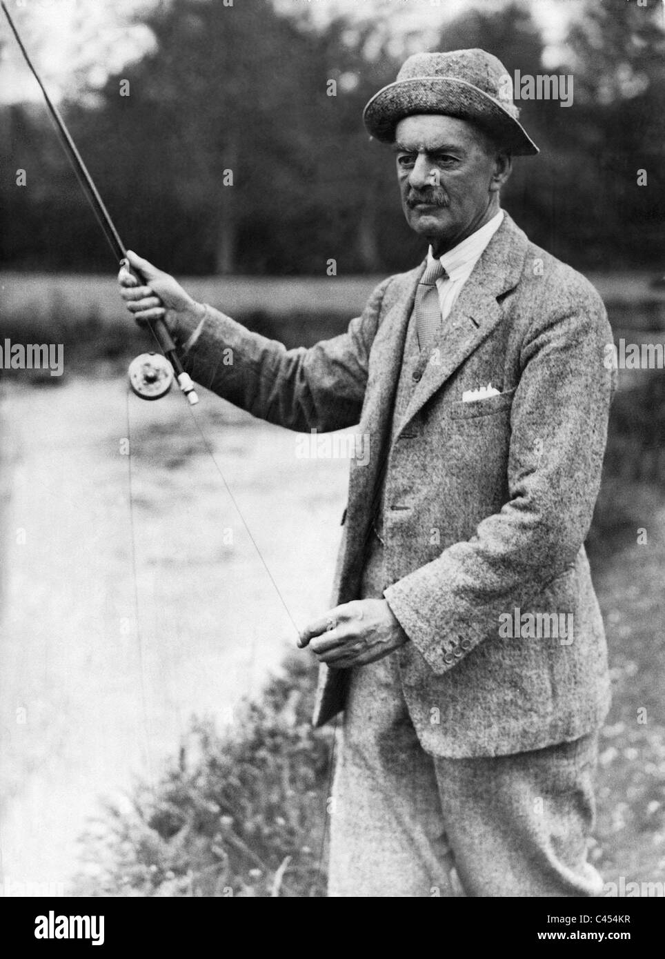 Arthur Neville Chamberlain while fishing, 1938 Stock Photo - Alamy