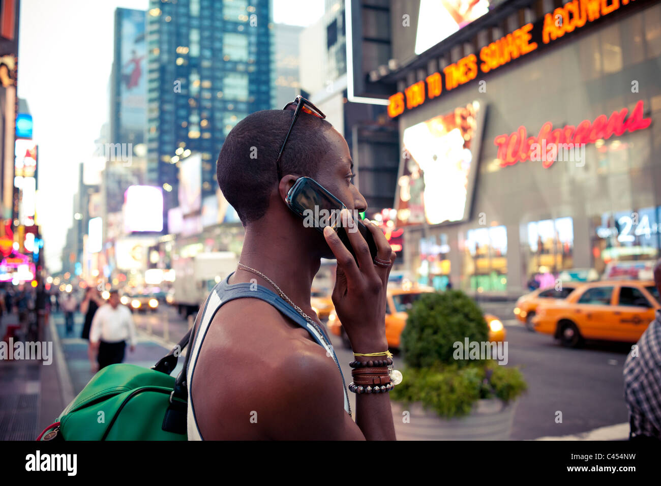 Users of cellular phones in Times Square in New York Stock Photo - Alamy