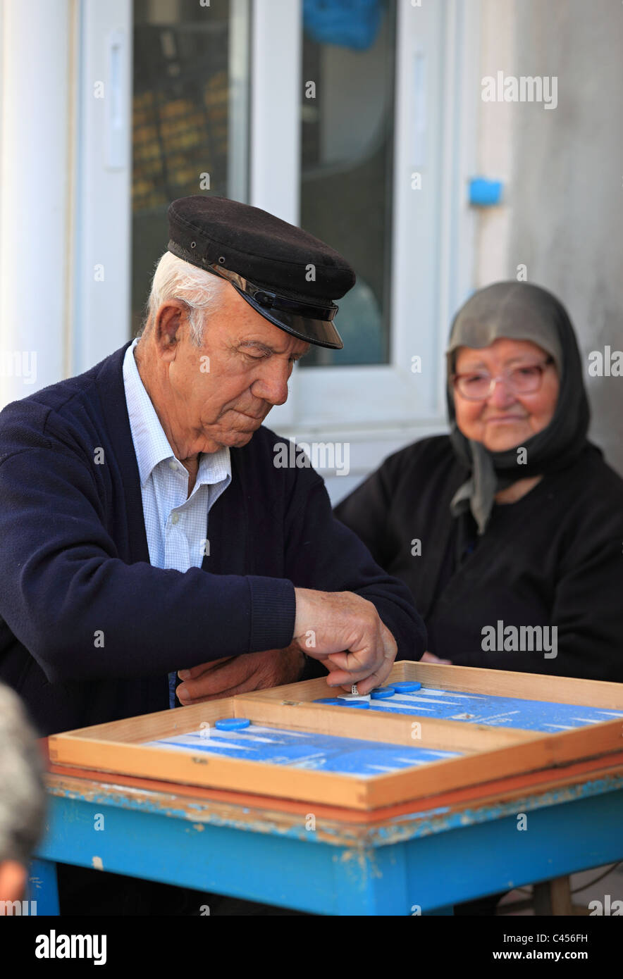 Old man playing backgammon in hi-res stock photography and images - Alamy