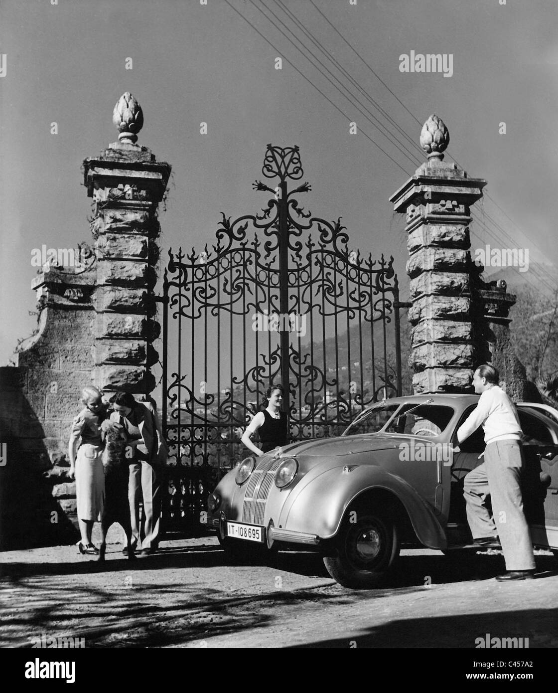 Man in front car Black and White Stock Photos & Images - Alamy