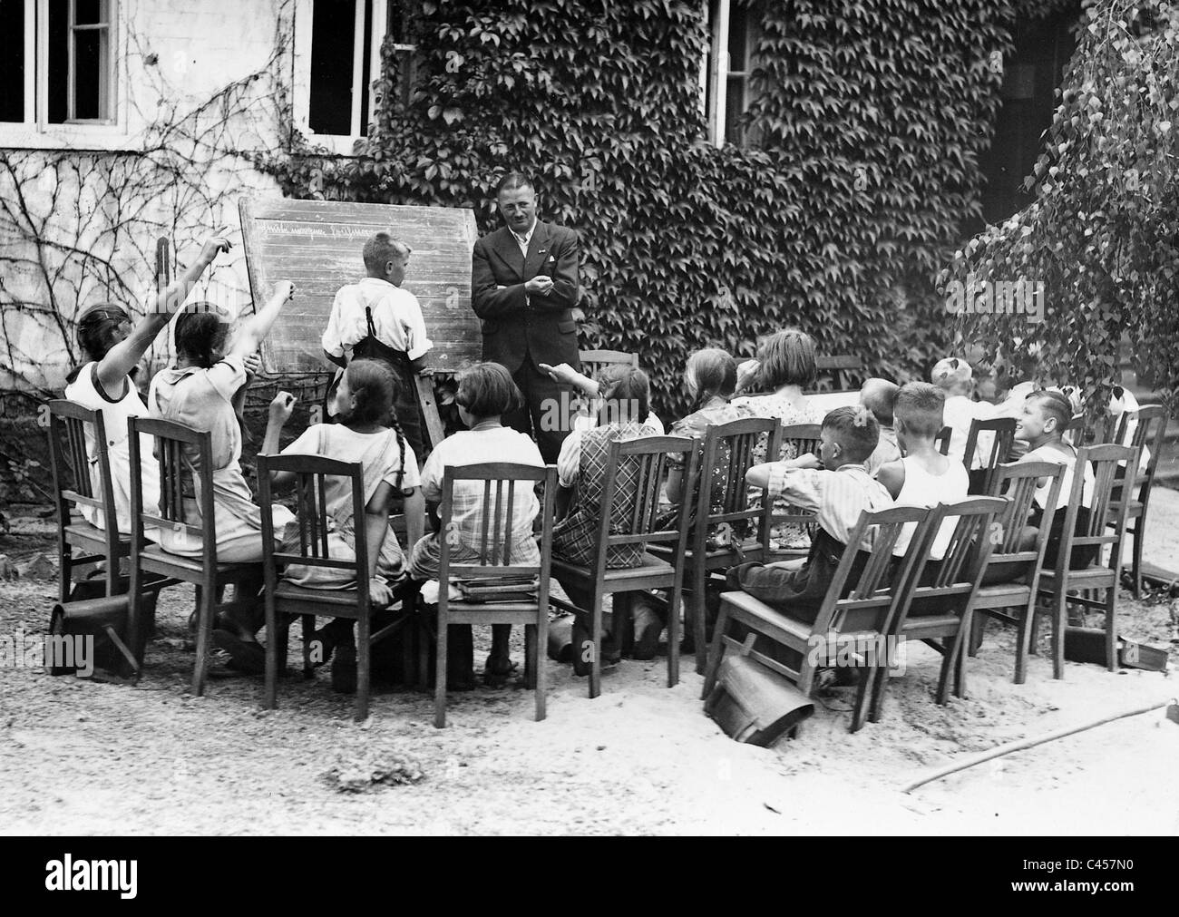 Class outside Black and White Stock Photos & Images - Alamy
